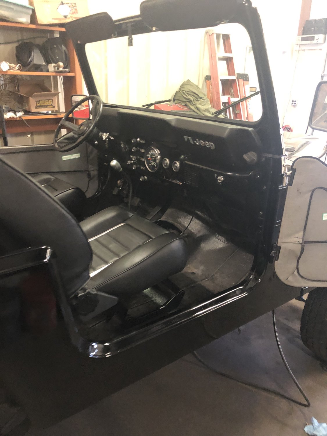 OMIX OE Replacement Jeep Logo Dash Pad in Black for 76-86 Jeep CJ-5, CJ ...