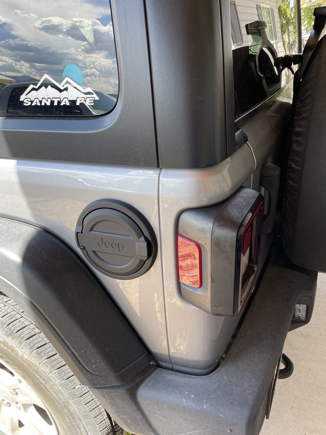 Mopar 82215123 Black Fuel Door for 18-22 Jeep Wrangler JL | Quadratec