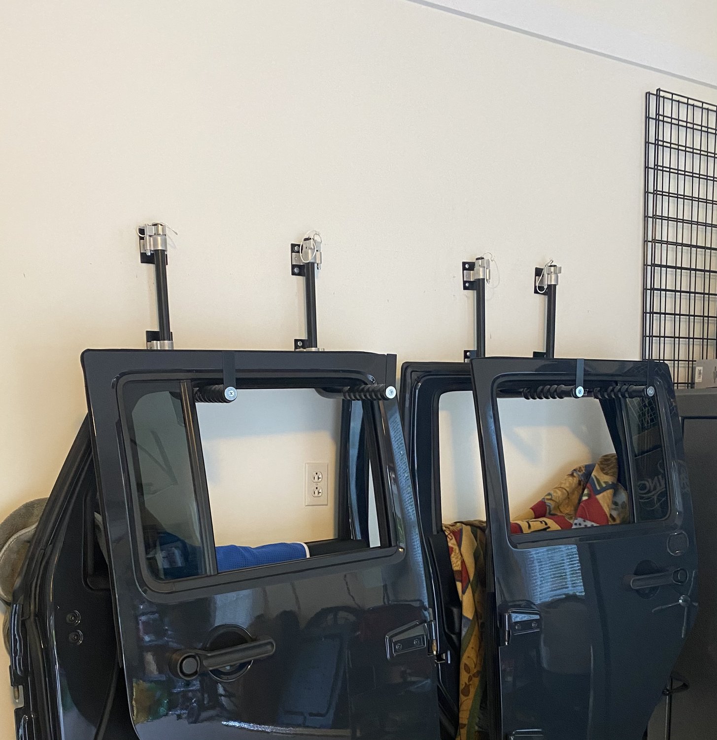 Surco DH1001 Wall mount Swing Away Door Hangers | Quadratec