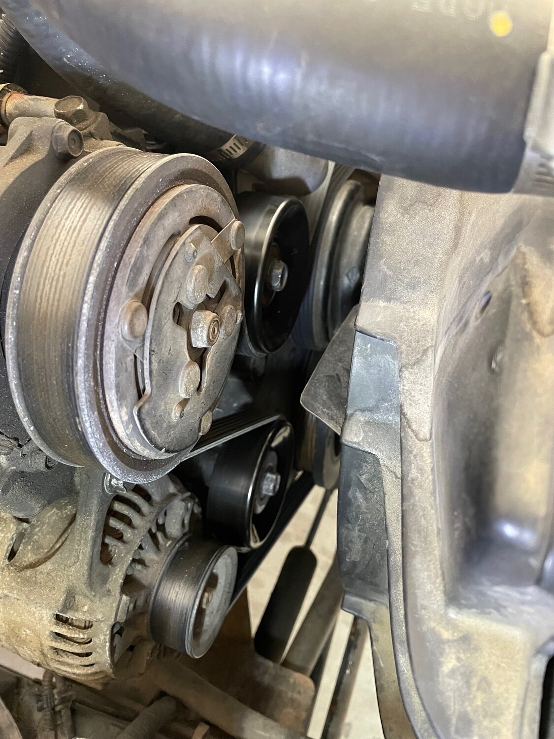 Crown Automotive 53002905 Idler Pulley for 87-95 Jeep Wrangler YJ, 97 ...