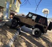 Bestop 56820-35 Trektop NX Soft Top for 97-06 Jeep Wrangler TJ | Quadratec