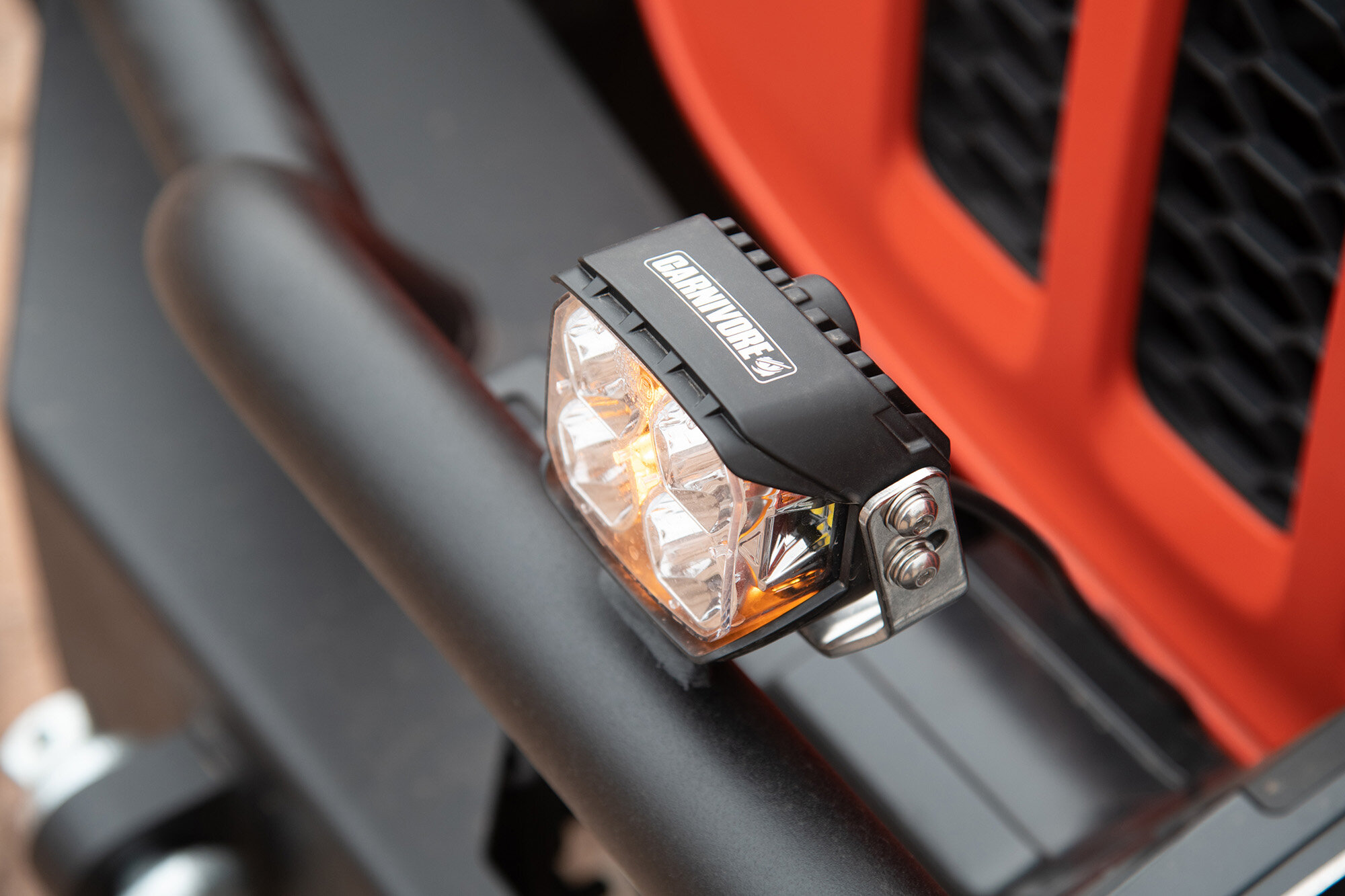Carnivore J-Series Auxiliary Pod Light with Amber Backlight | Quadratec